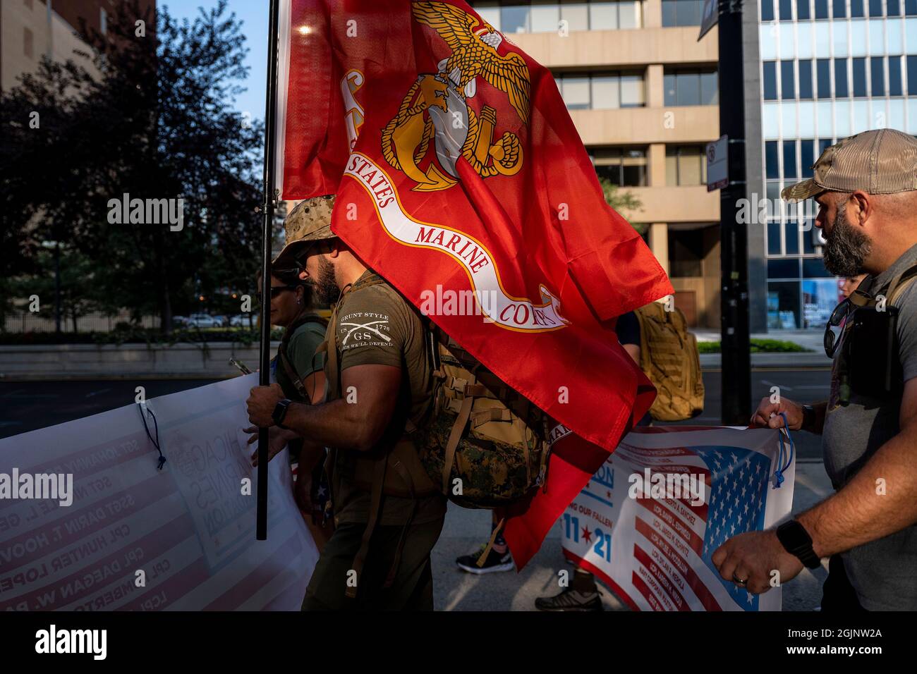 Veterans and their families walk during a memorial hosted by the ...