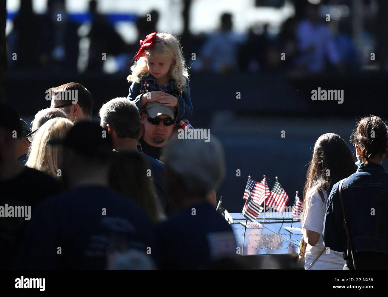 New York, USA. 11th Sep, 2021. People gather at the National 9/11 ...