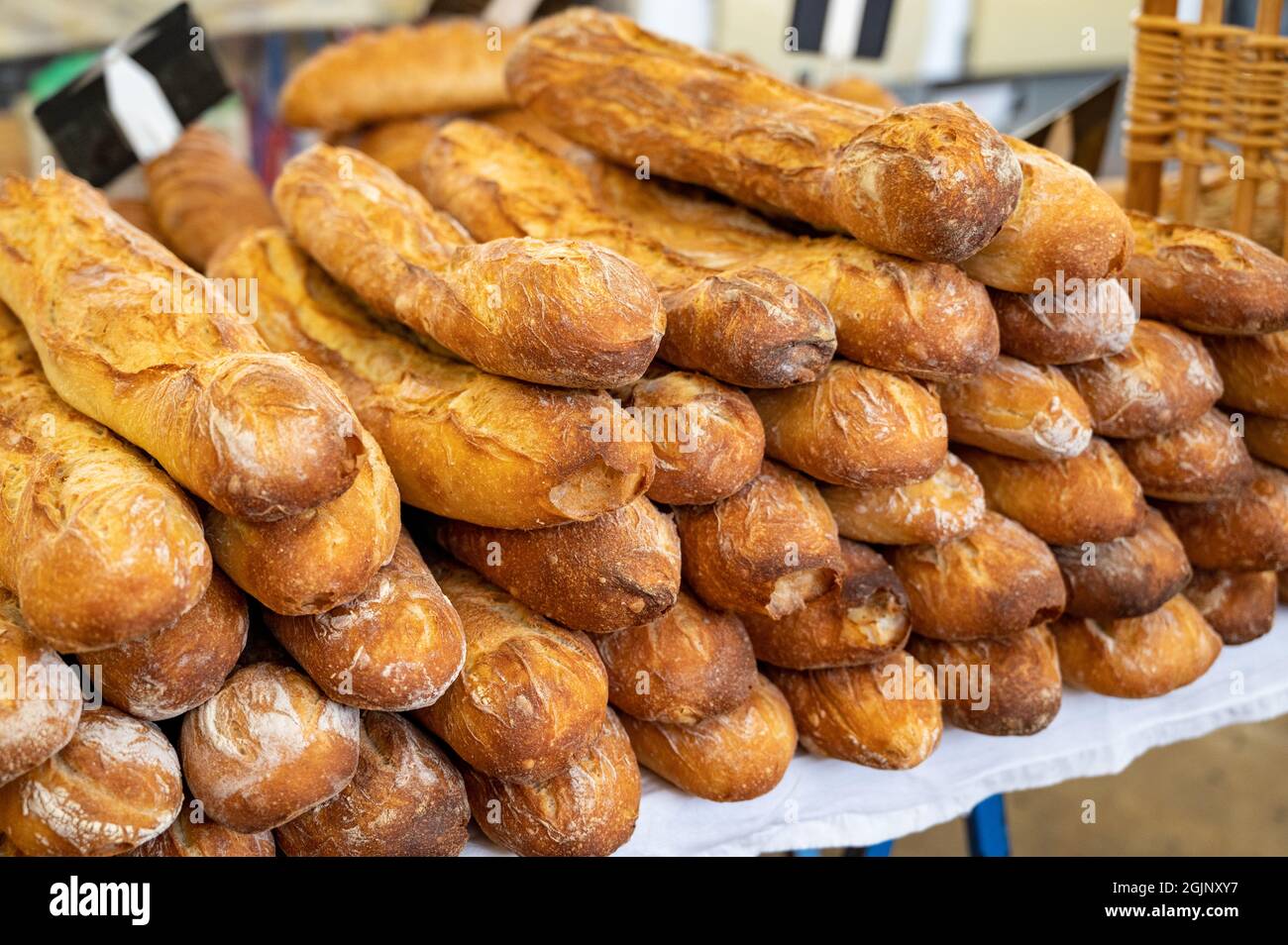 French bakery, many fresh baked baguettes breads ready for sale close ...