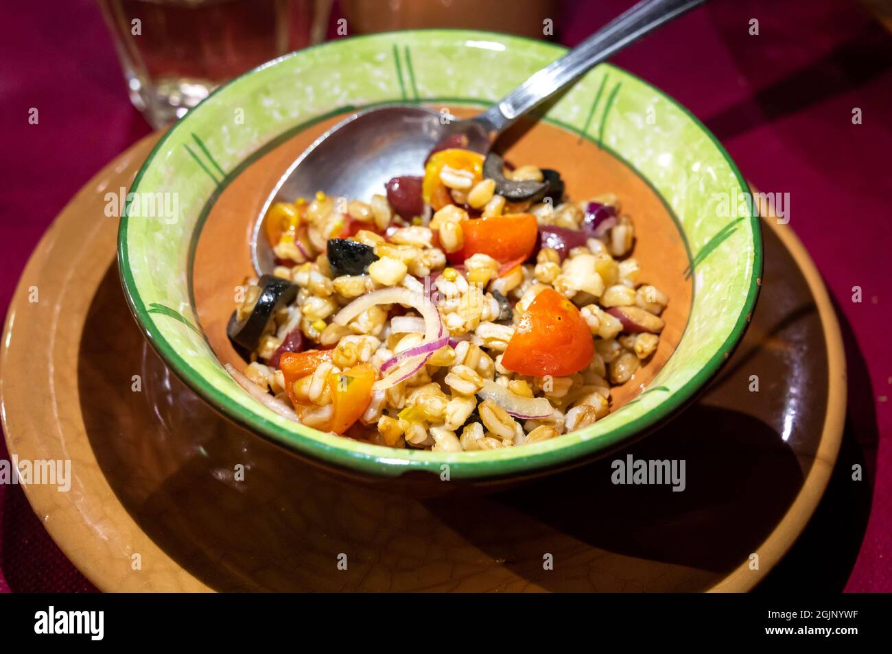 Ancient roman food antipasti pearl barley salad with tomatoes, olives ...