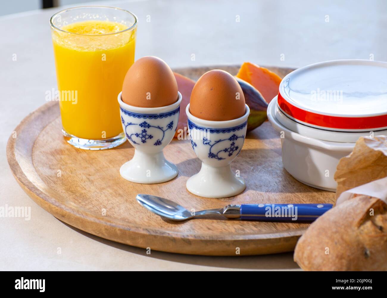 Continental breakfast with soft-boiled chicken egg served outdoor in ...