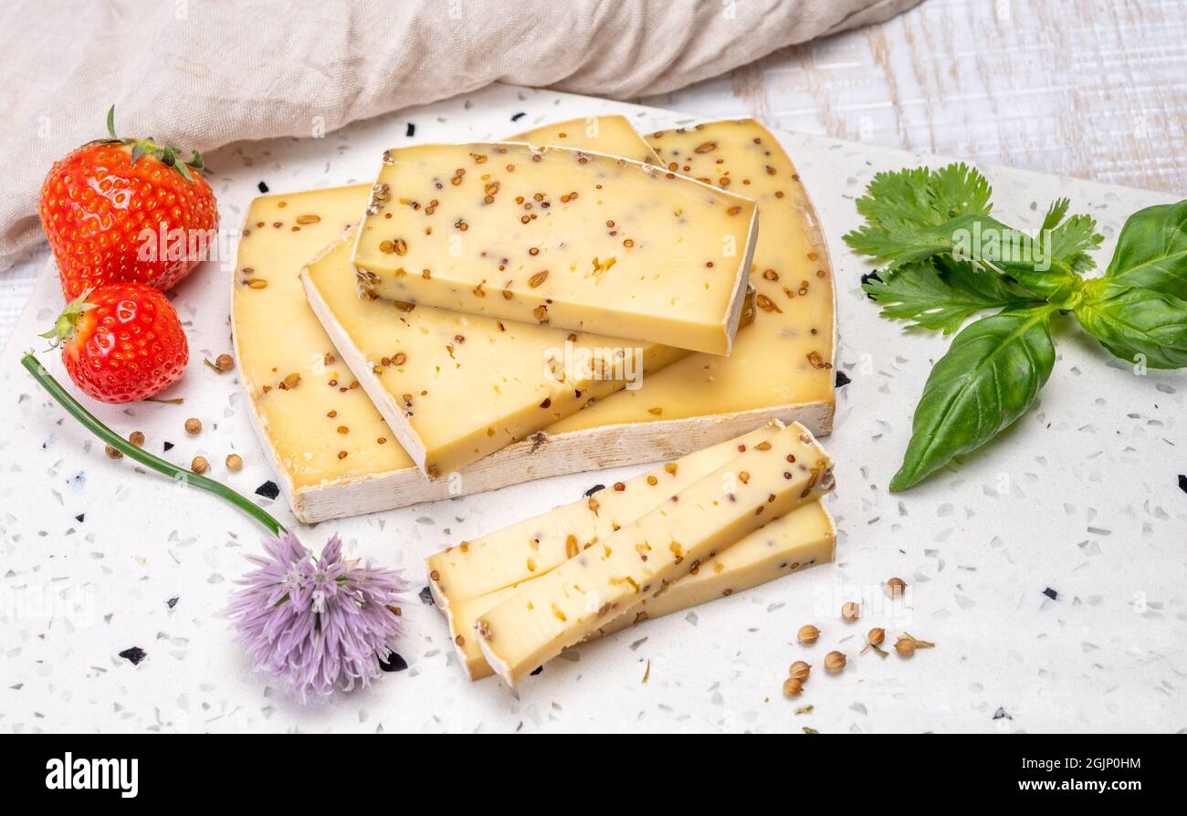 Cheese collection, matured yellow cow cheese with mustard seeds from ...
