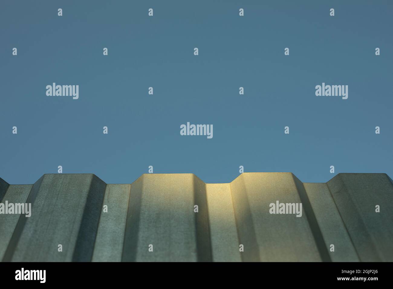 Simple fence made of unpainted metal. Stainless steel fence parts ...