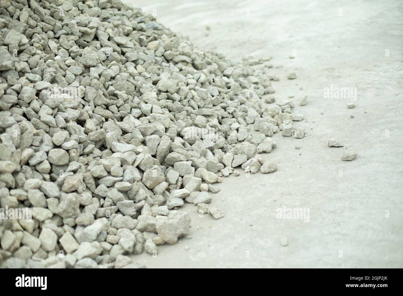 Building material small stone. Lots of rubble on the road. A slide of ...