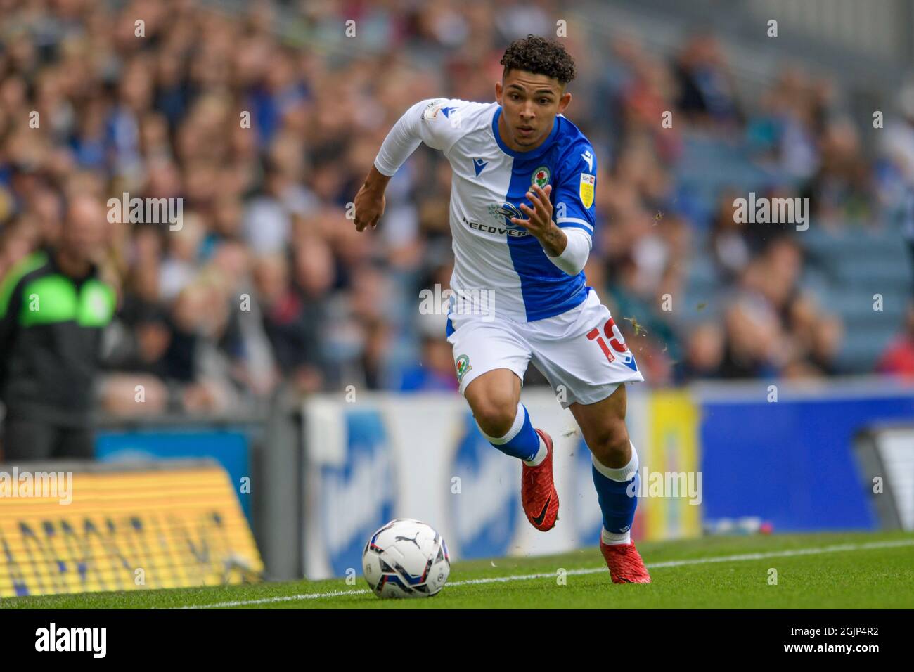 Tyrhys Dolan #10 of Blackburn Rovers runs down the wing with the ball ...