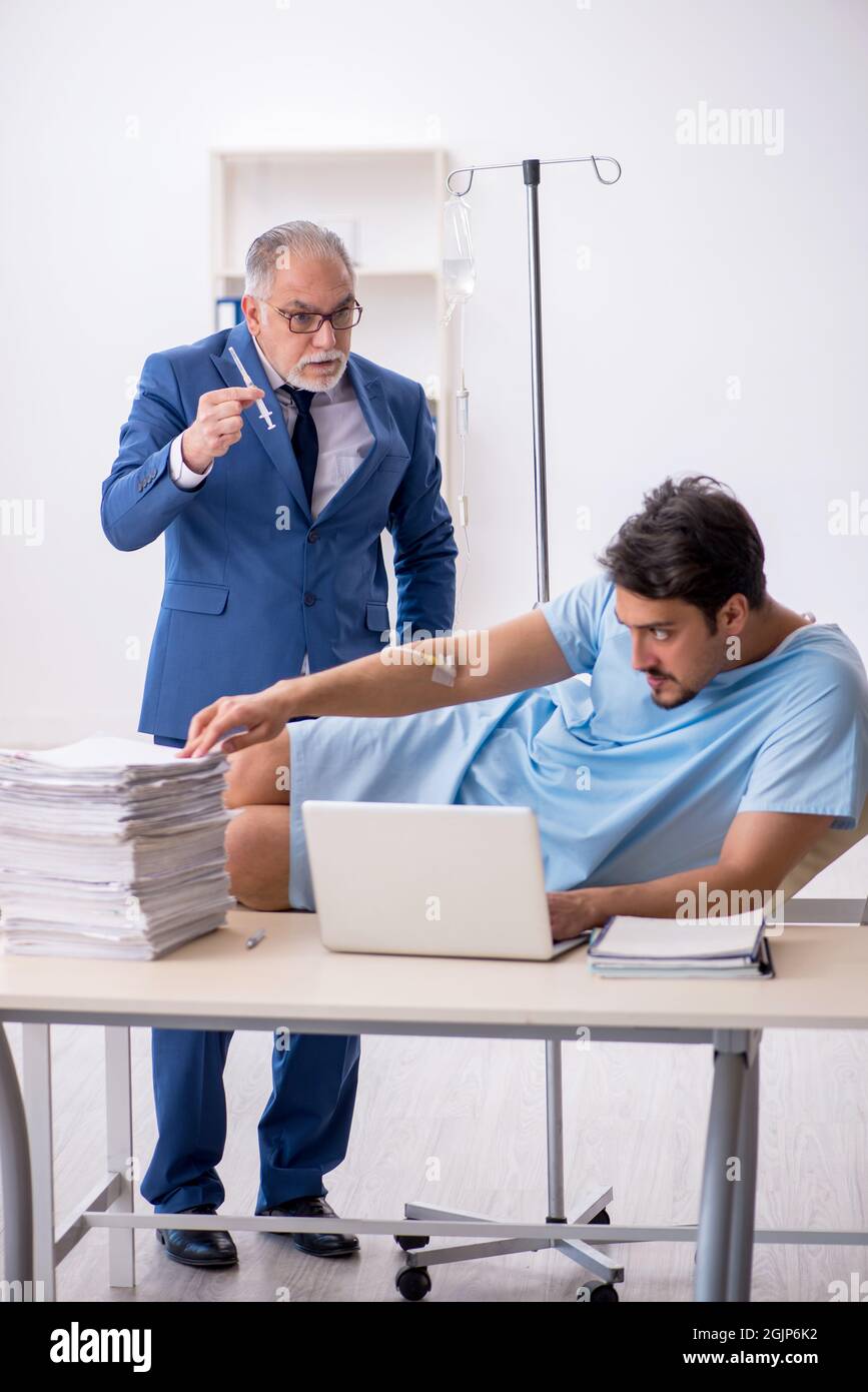 Young employee feeling bad at workplace Stock Photo - Alamy