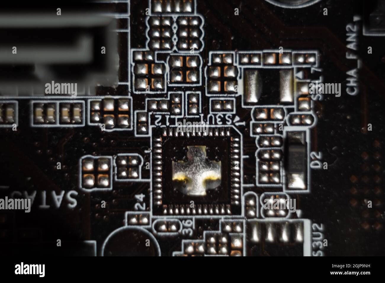 Details of a mobo or main printed circuit board Stock Photo - Alamy