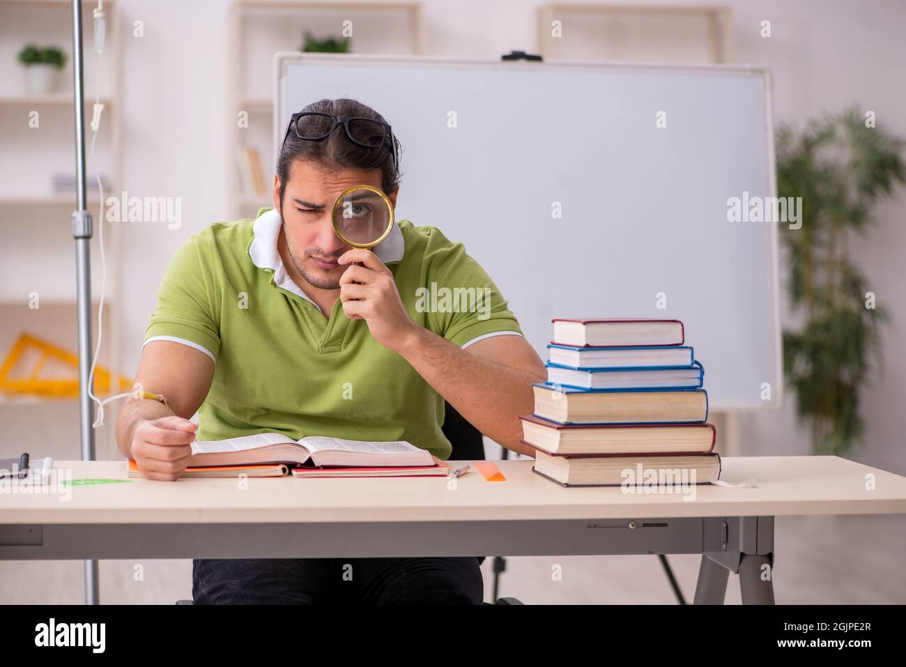 Young sick teacher student in blood transfusion concept Stock Photo - Alamy
