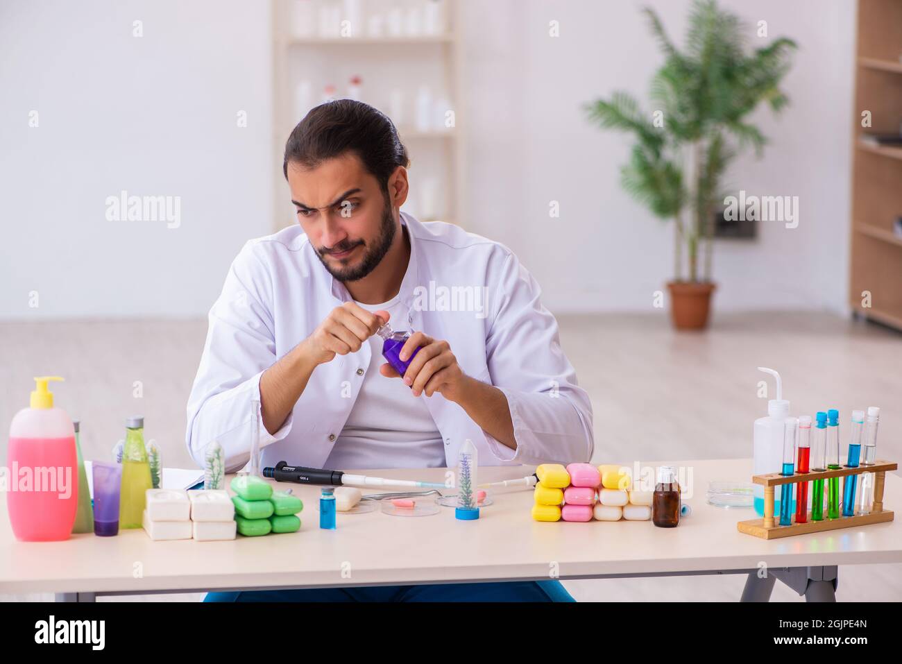 Young chemist testing soap in the lab Stock Photo - Alamy
