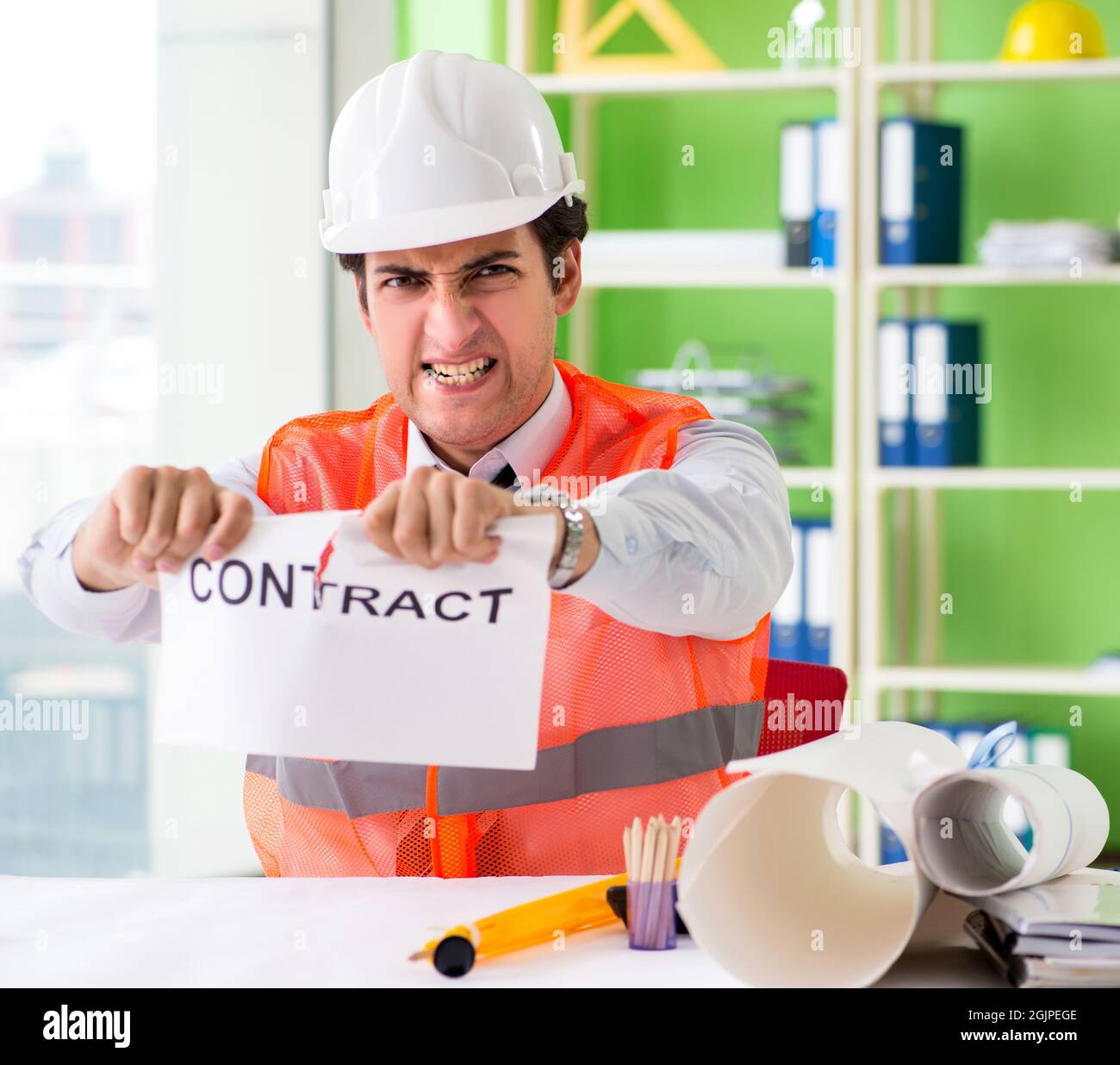 Angry construction supervisor cancelling the contract Stock Photo - Alamy