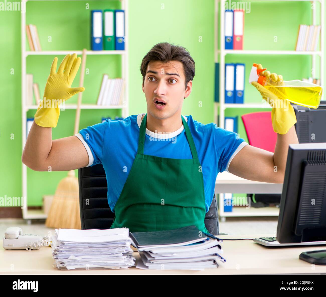 The male spy under cleaner cover stealing confidential documents Stock ...