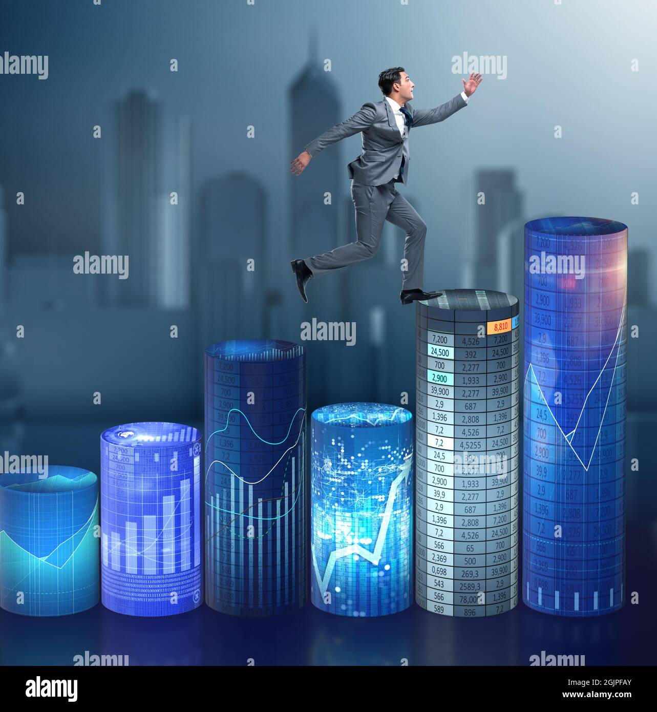 The businessman jumping over bar charts Stock Photo - Alamy