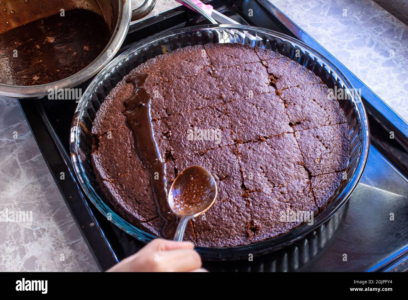 Woman cooking cake hi-res stock photography and images - Alamy
