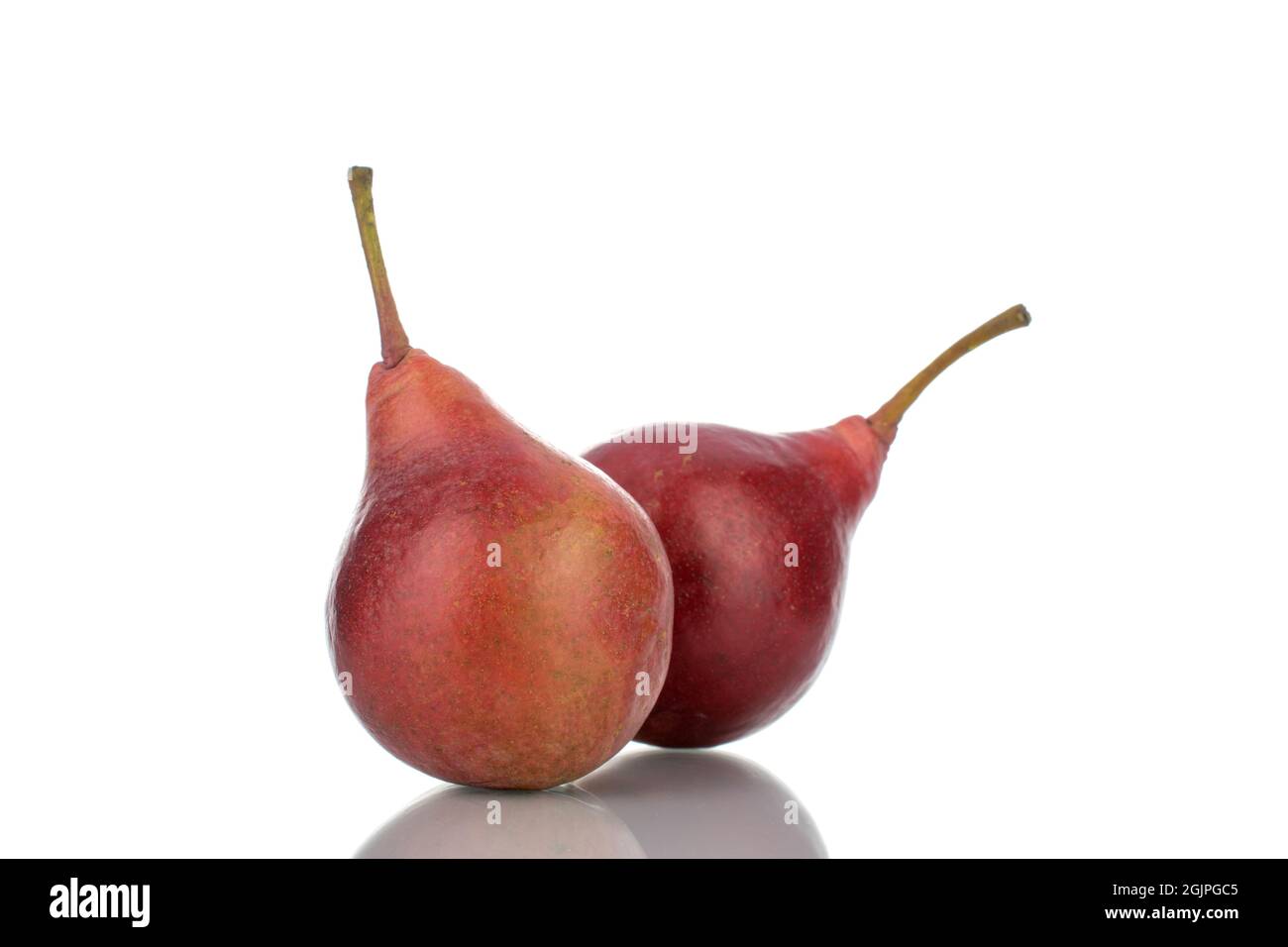 Two ripe red pears, close-up, isolated on white Stock Photo - Alamy