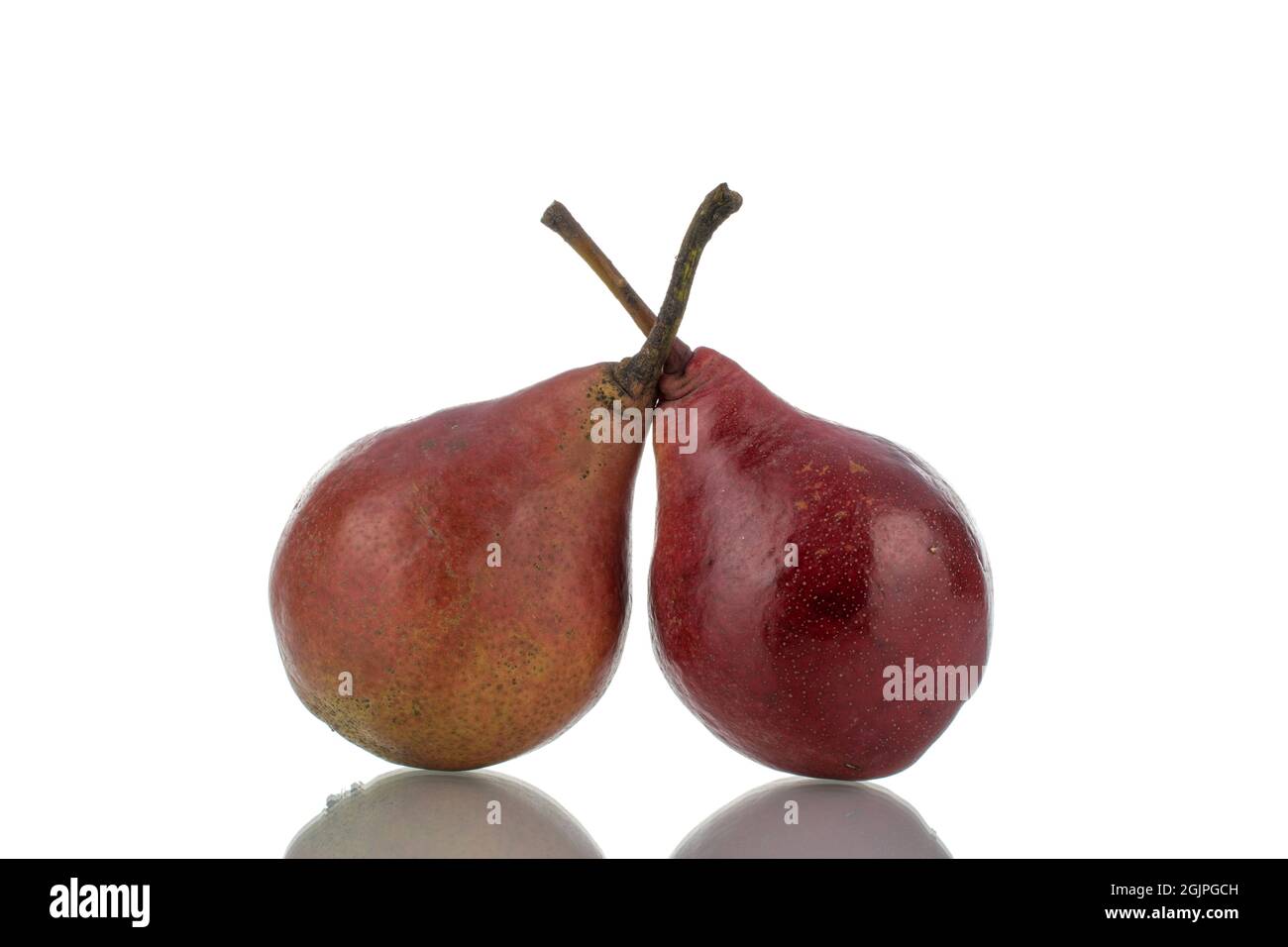 Two ripe red pears, close-up, isolated on white Stock Photo - Alamy