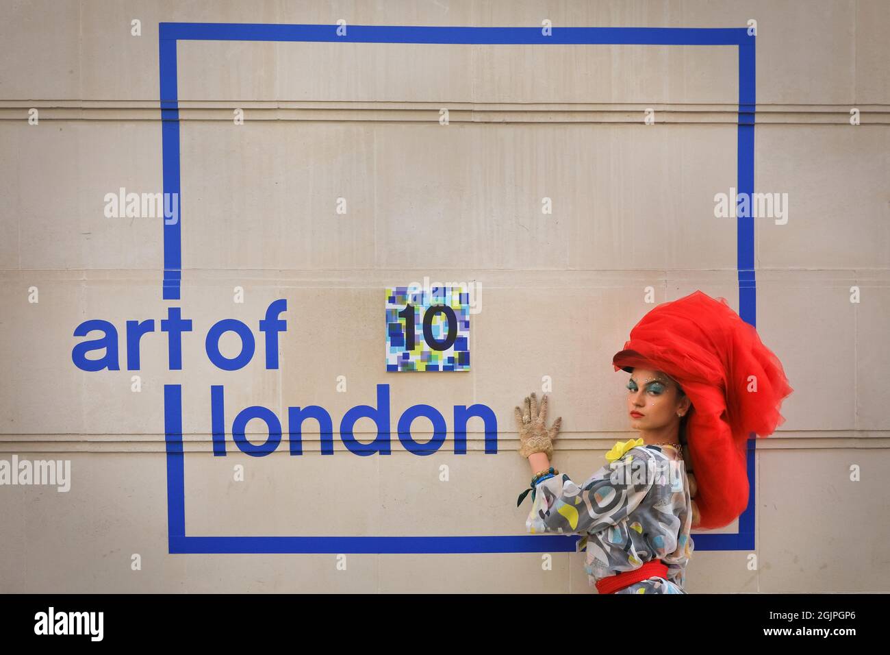 London, UK. 11th Sep, 2021. Models pose in extravagant outfits and ...