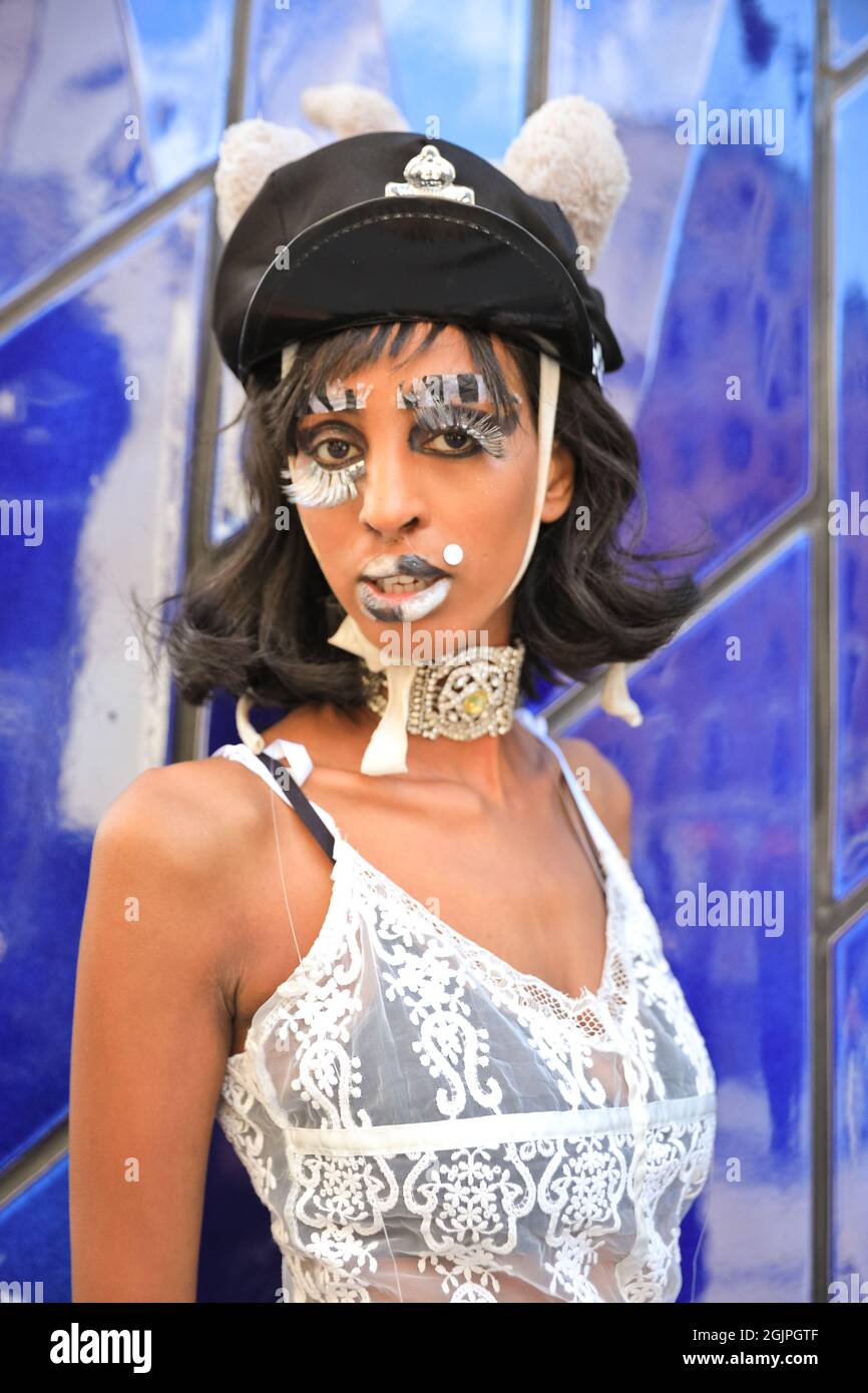 London, UK. 11th Sep, 2021. Models pose in extravagant outfits and ...