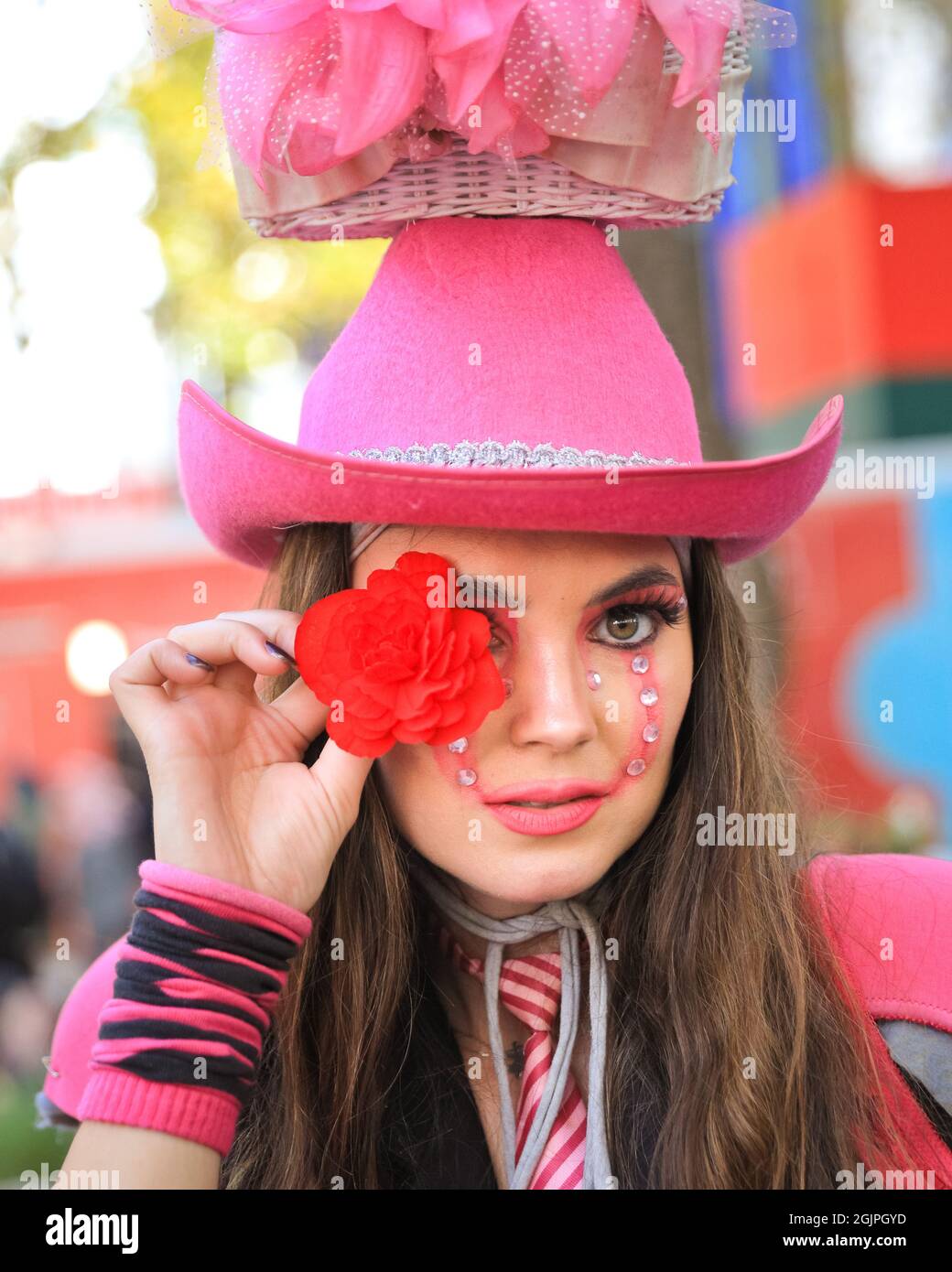 London, UK. 11th Sep, 2021. Models pose in extravagant outfits and ...