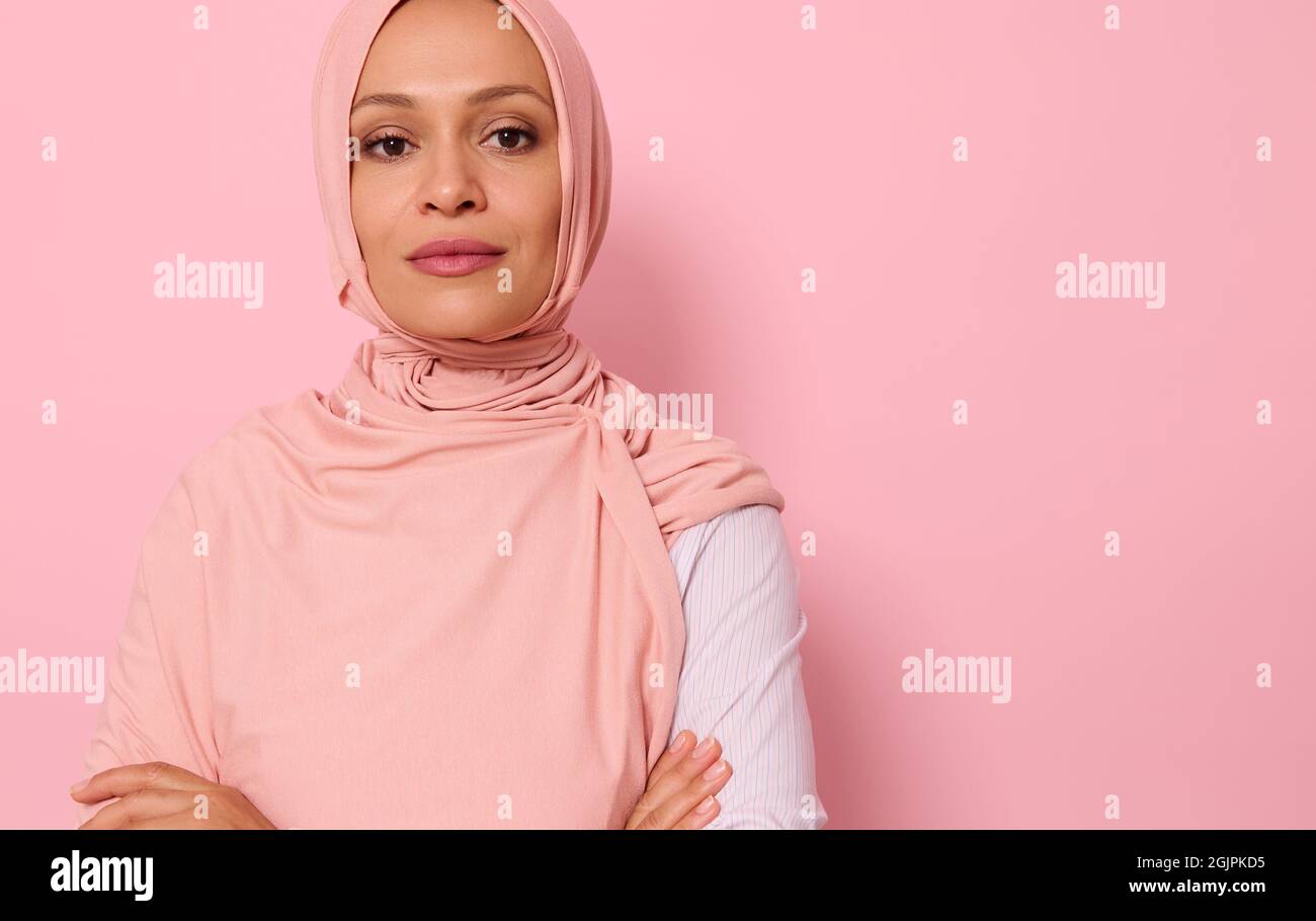 Headshot, close-up face portrait of a gorgeous Arabic Muslim woman in ...