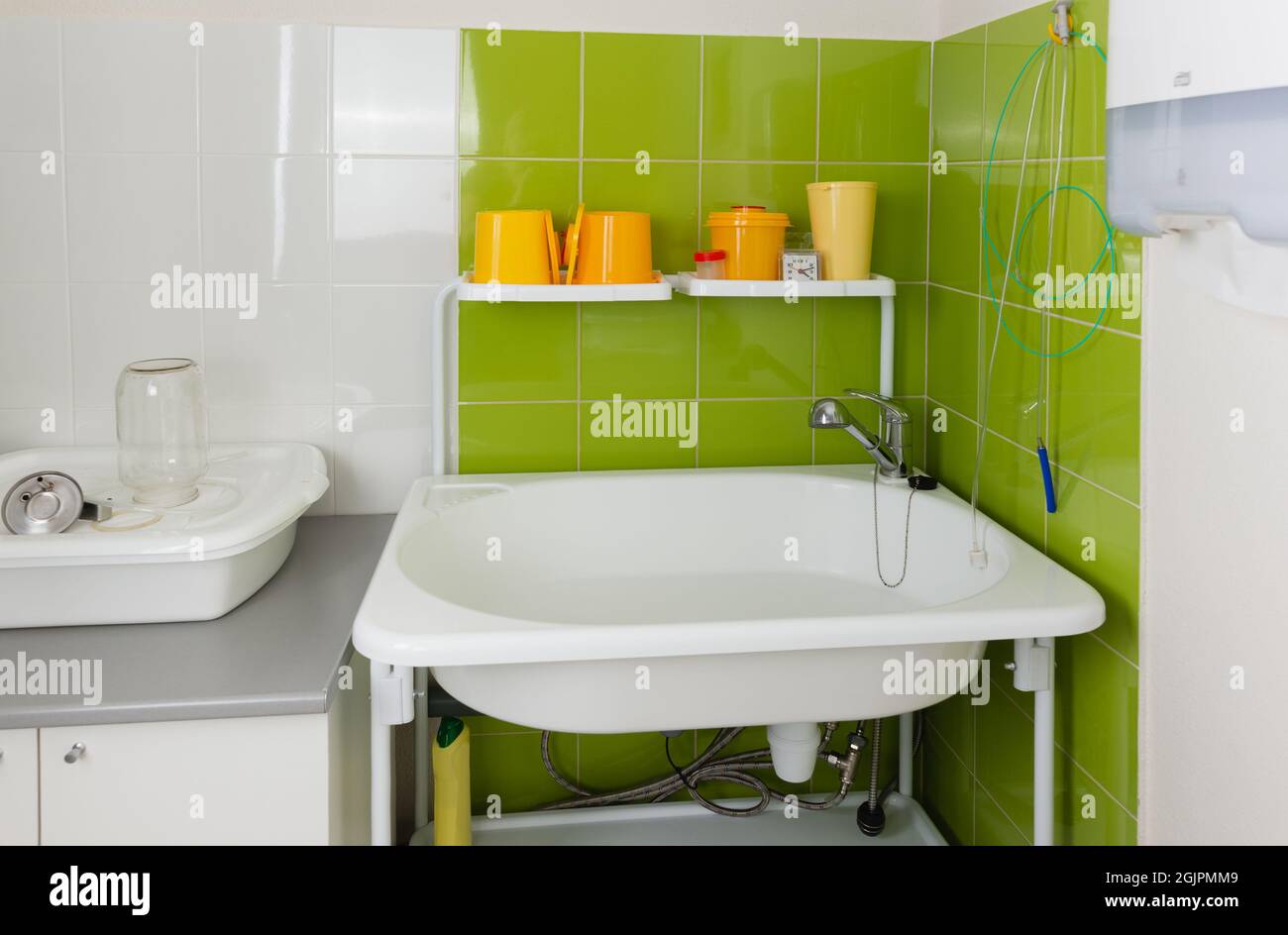 Sink for washing and disinfection in the clinic room for processing ...