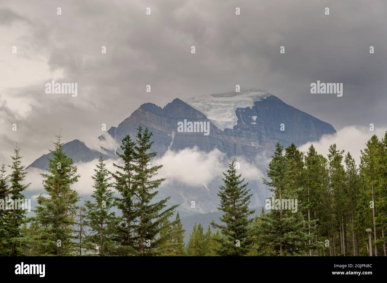 Lake Louise in cloudy day in summer in Banff National Park, Alberta ...