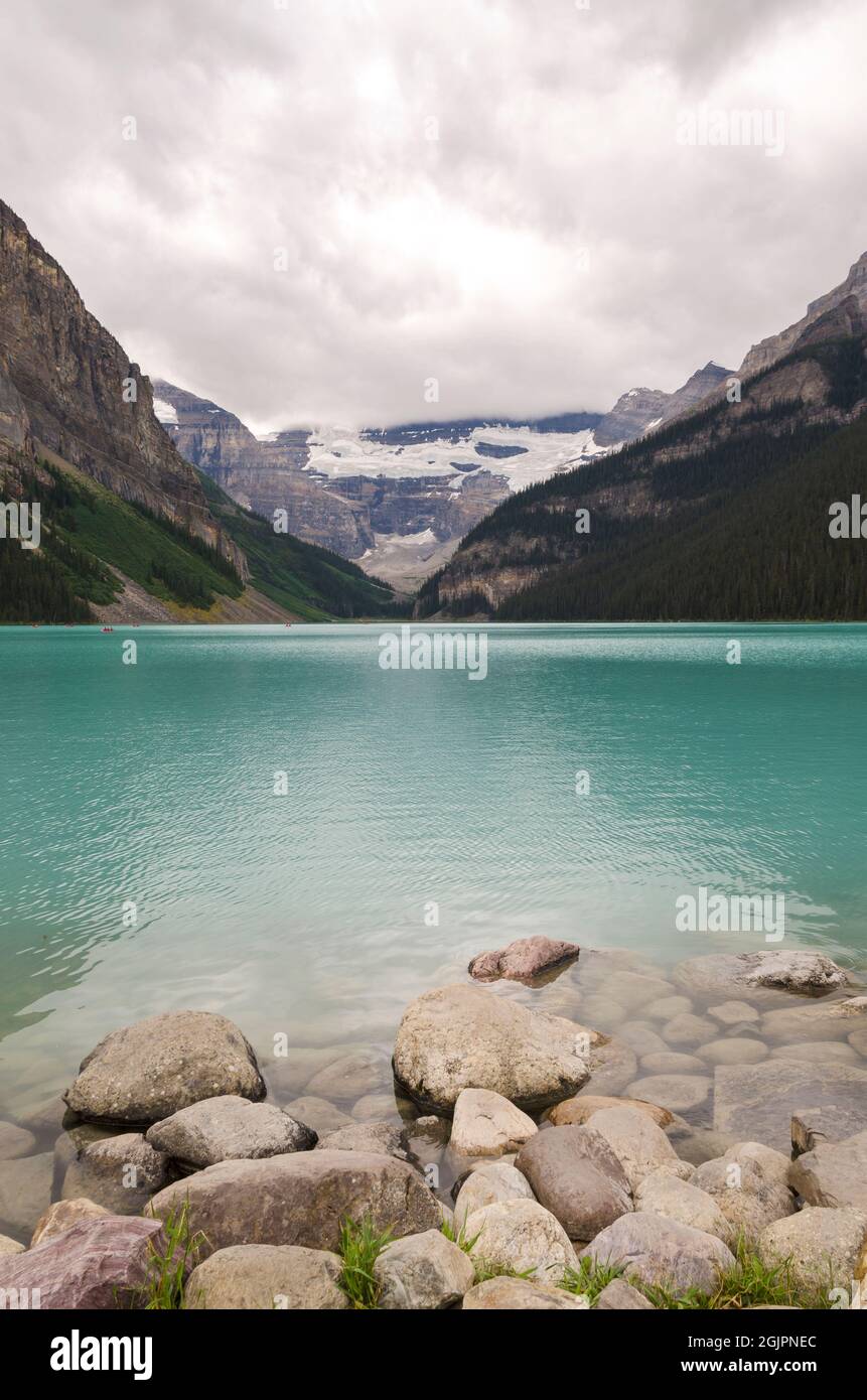 Lake Louise in cloudy day in summer in Banff National Park, Alberta ...