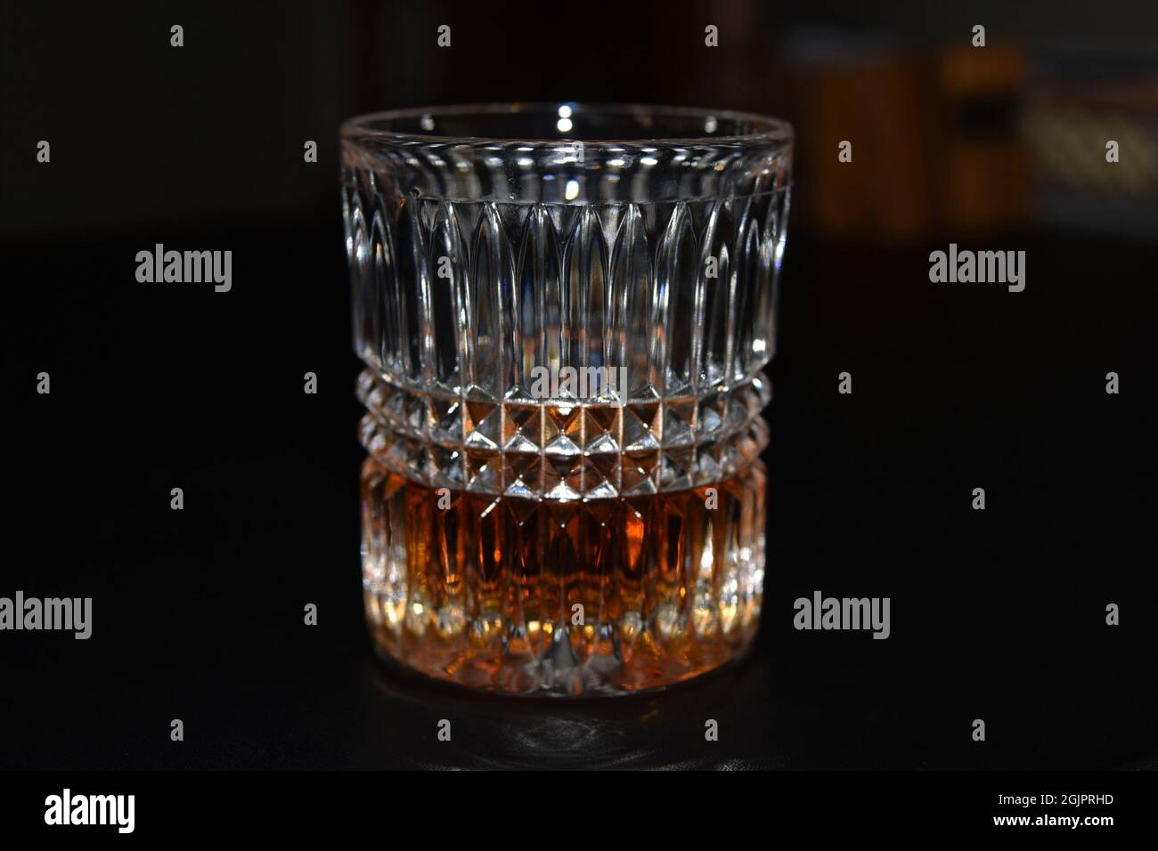 Studio concept shot of whisky in a crystal glass served neat Stock ...