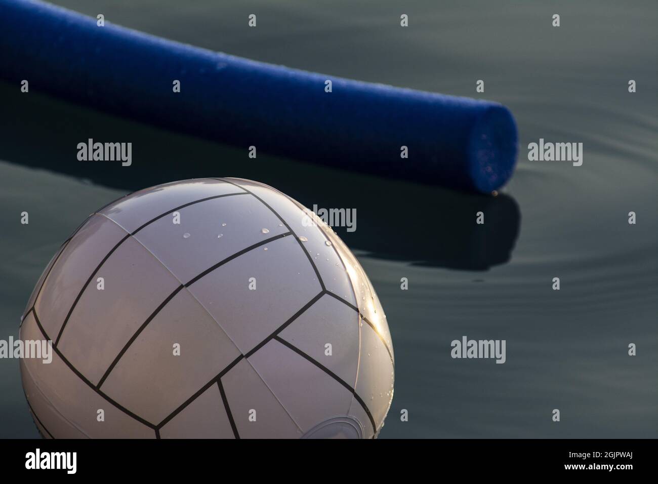 Soccer ball on a pool water surface Stock Photo - Alamy