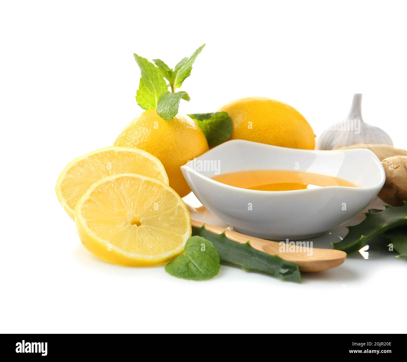 Beautiful composition with natural cold remedies on white background ...