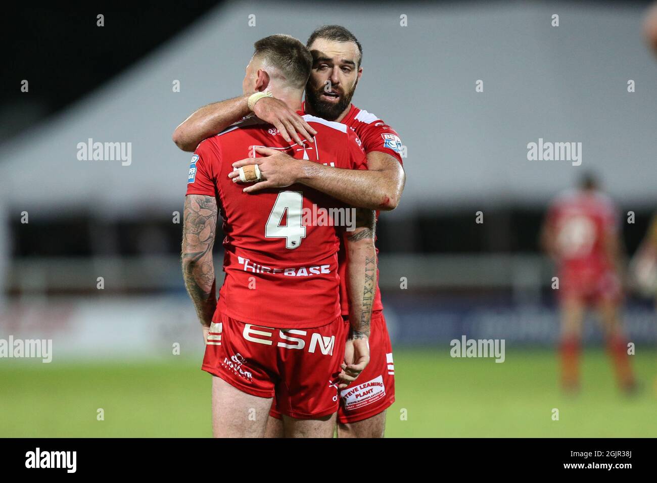Shaun Kenny-Dowall (4) of Hull KR celebrates the win with Kane Linnett ...