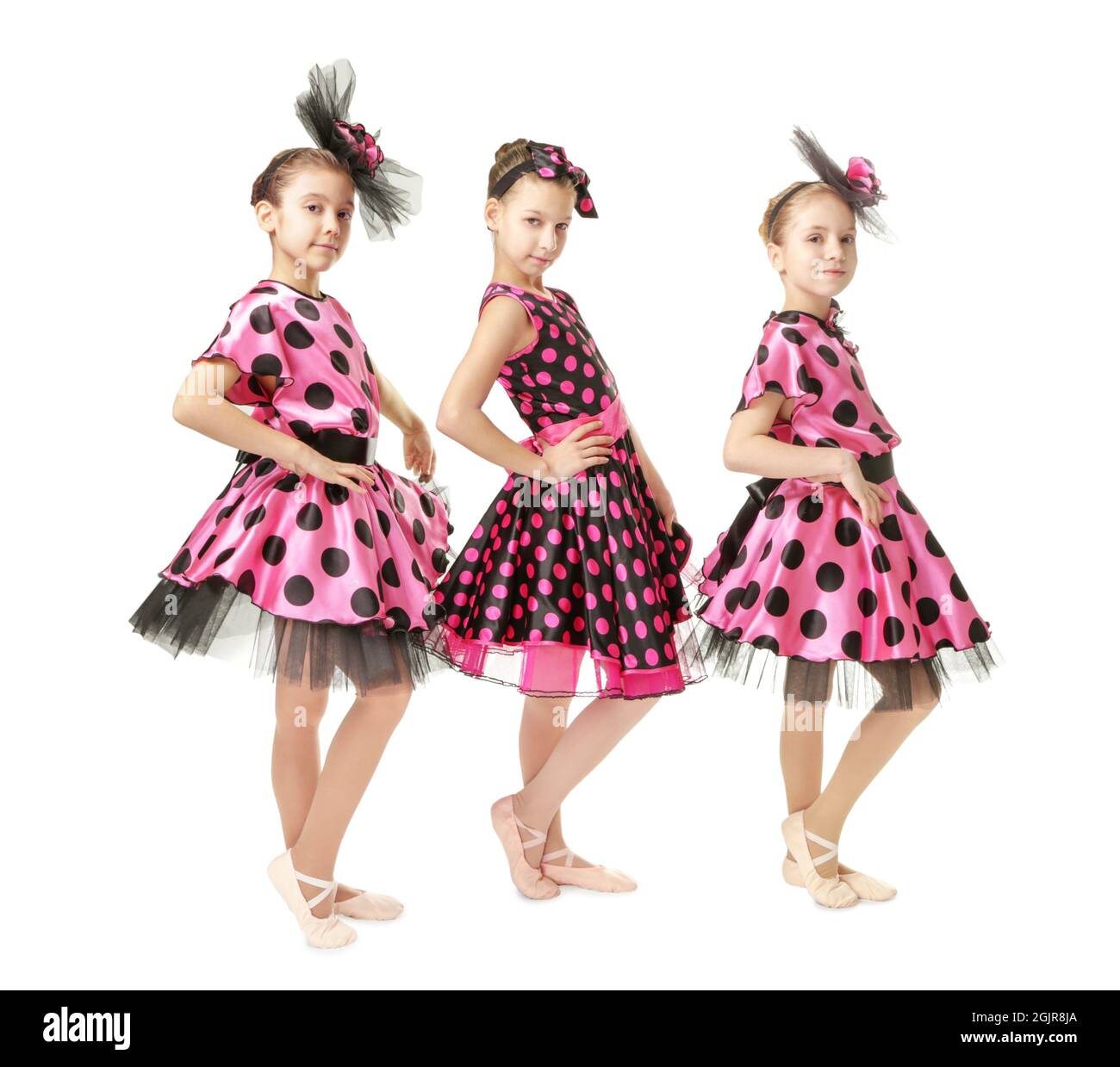 Cute little dancers on white background Stock Photo - Alamy