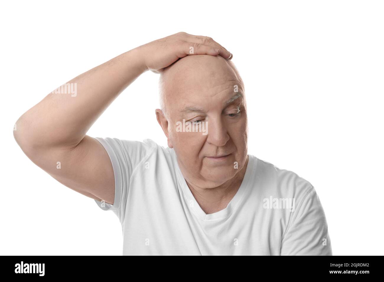 Bald senior man on white background Stock Photo - Alamy