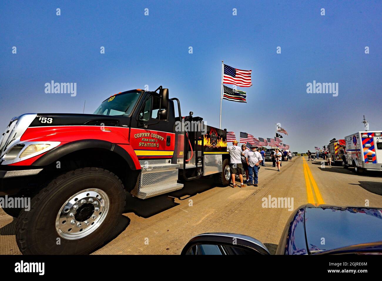 Melvern, Kansas, September 11, 2021 Local people gather with members of ...