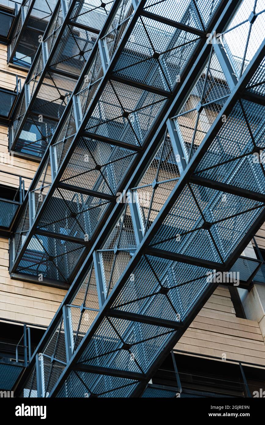 Lattice metal walkways between two modern buildings Stock Photo - Alamy