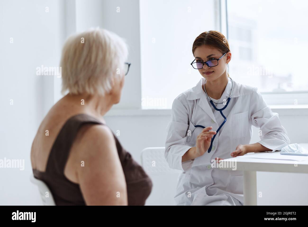 female doctor patient examination health diagnostics Stock Photo - Alamy