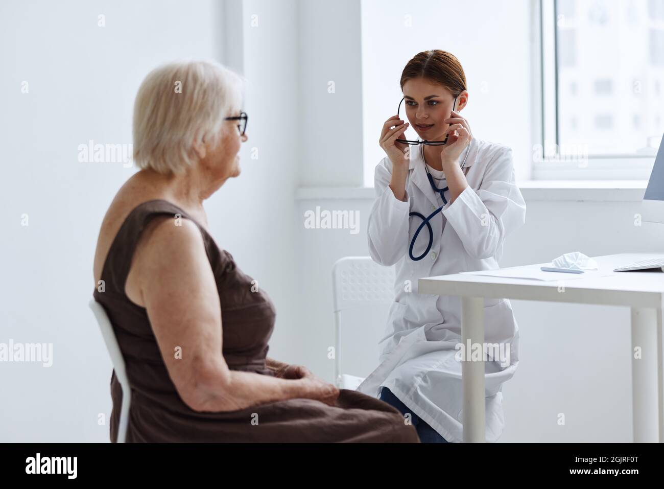 doctors in the medical office patient examination health diagnostics ...