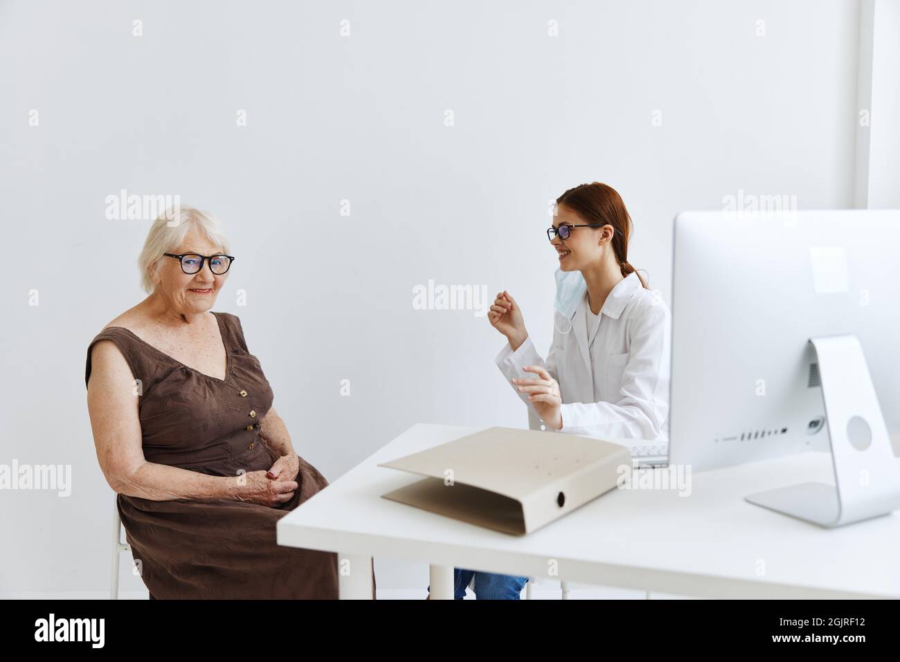 female doctor patient examination health care Stock Photo - Alamy