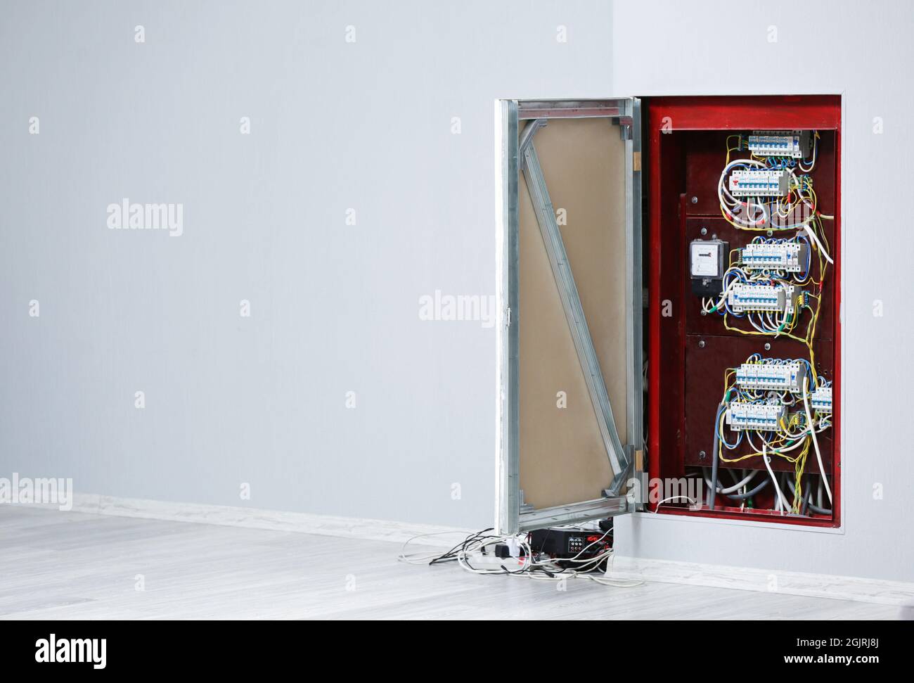 Open distribution board integrated in wall Stock Photo - Alamy