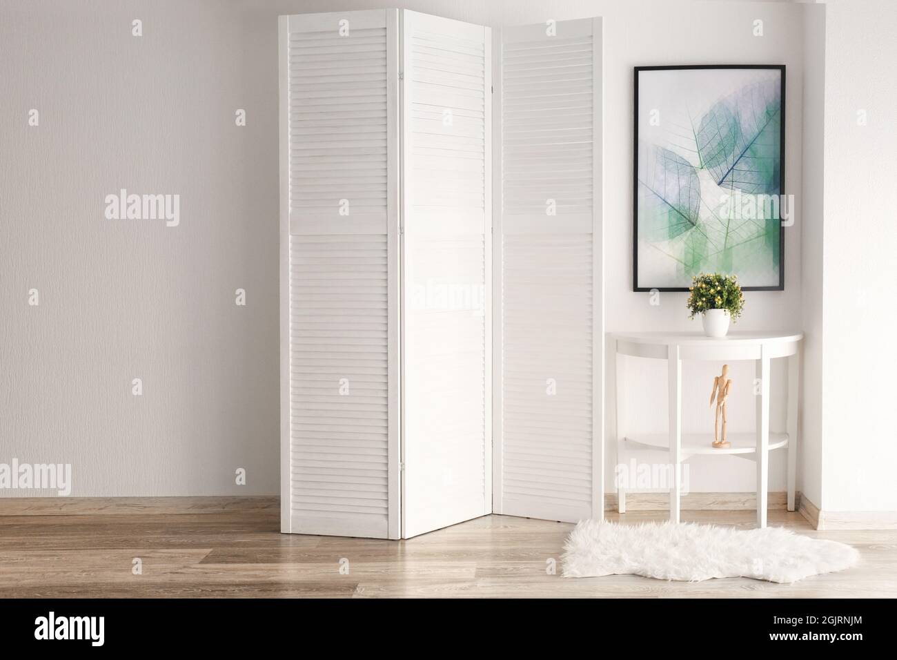 Light room interior with folding screen Stock Photo - Alamy