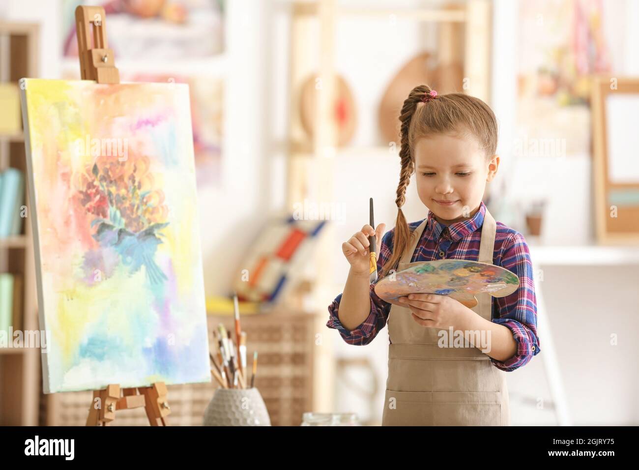 Cute little artist in studio Stock Photo - Alamy
