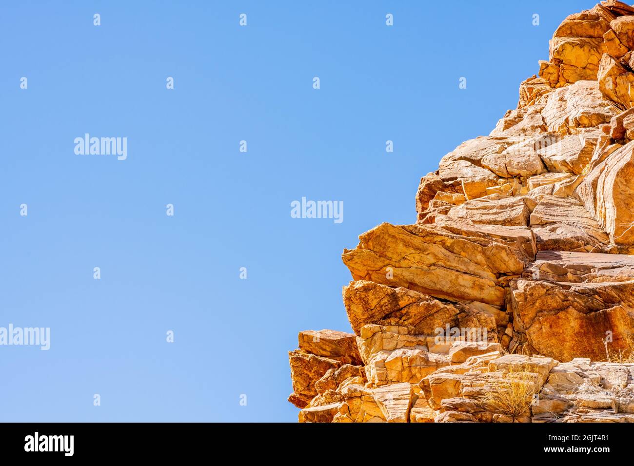 Rocky Cliff Glowing Bright Orange On Clear Sunny Day in Big Bend ...