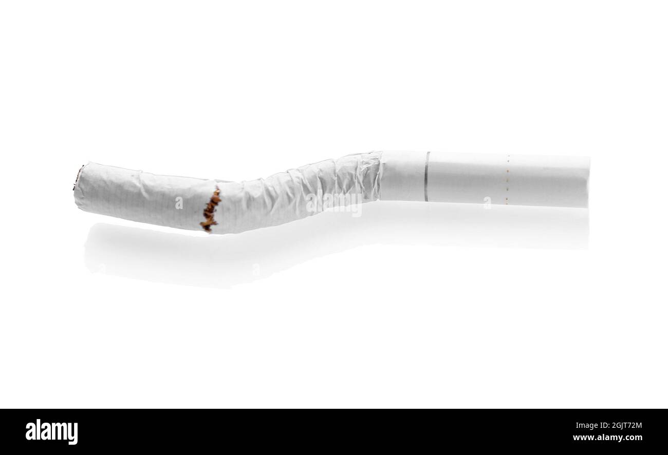 Broken cigarette on white background Stock Photo - Alamy