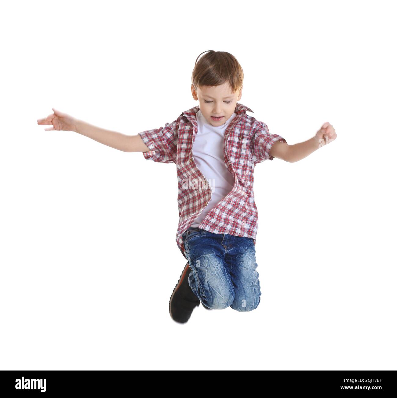 Cute boy jumping on white background Stock Photo - Alamy