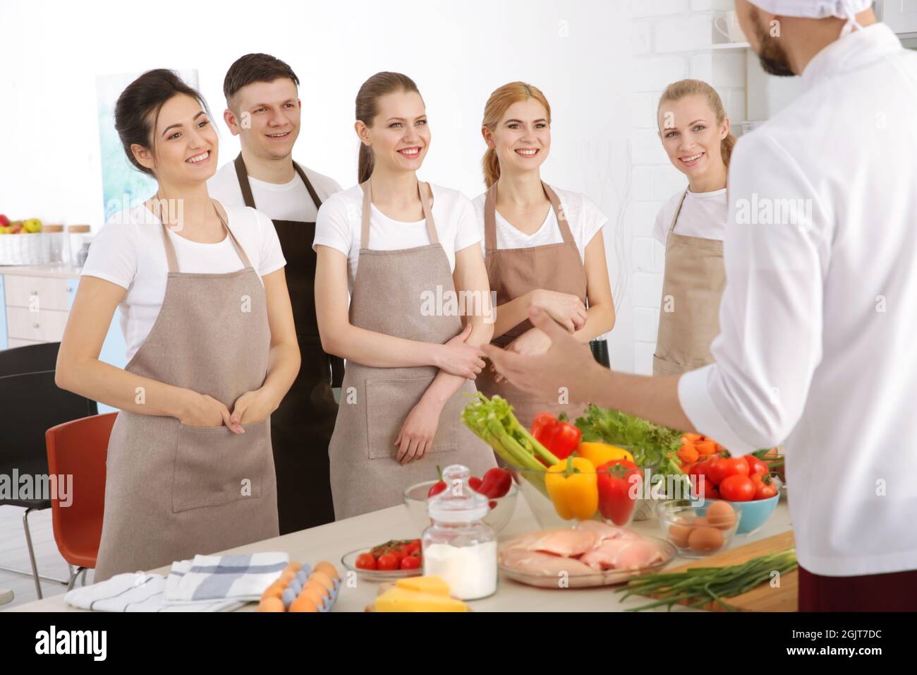 Group of people at cooking classes Stock Photo - Alamy