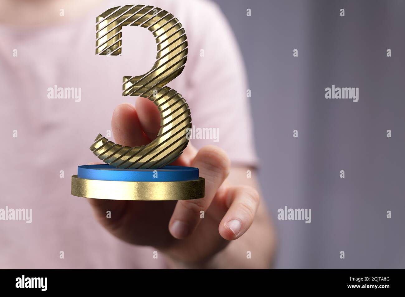 A person presenting the virtual projection of gold third-place trophy ...