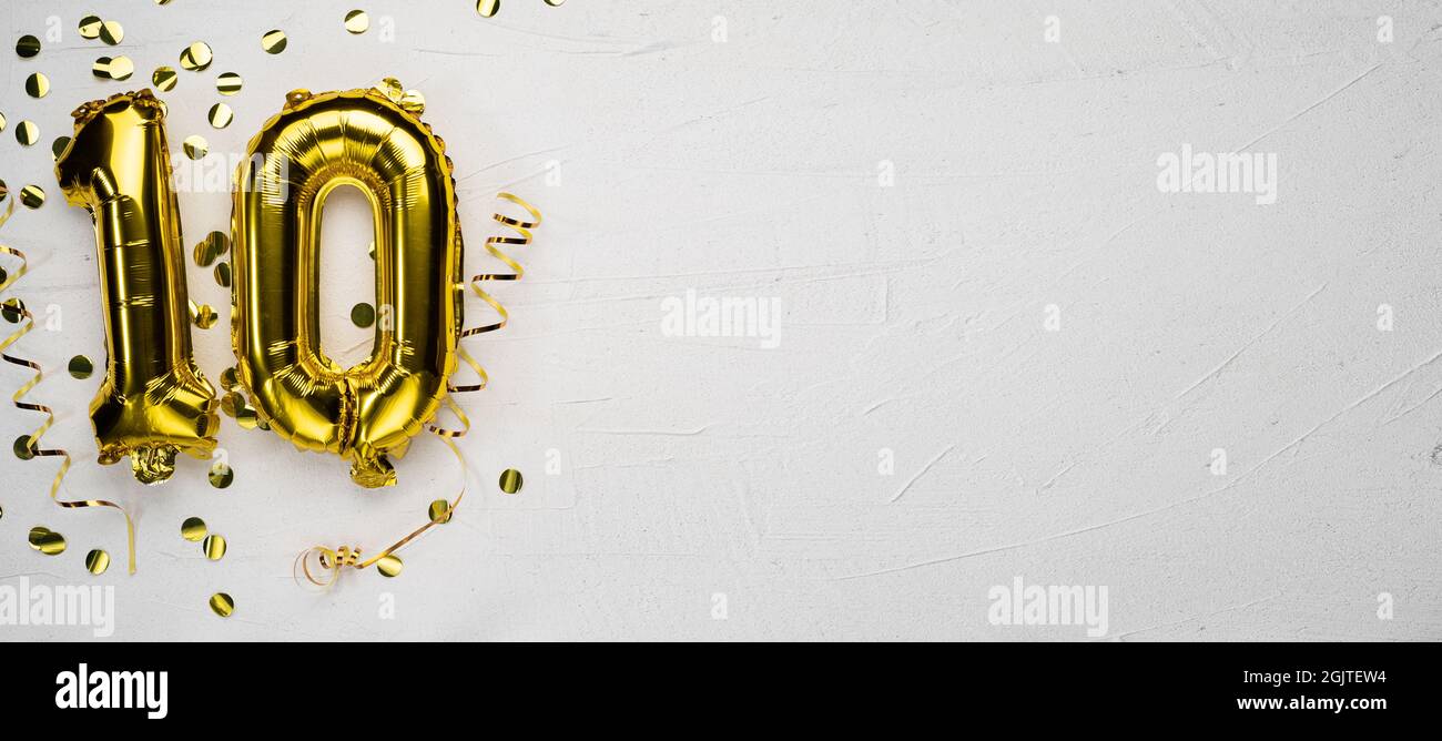 golden foil balloon number ten. Birthday or anniversary card with the ...