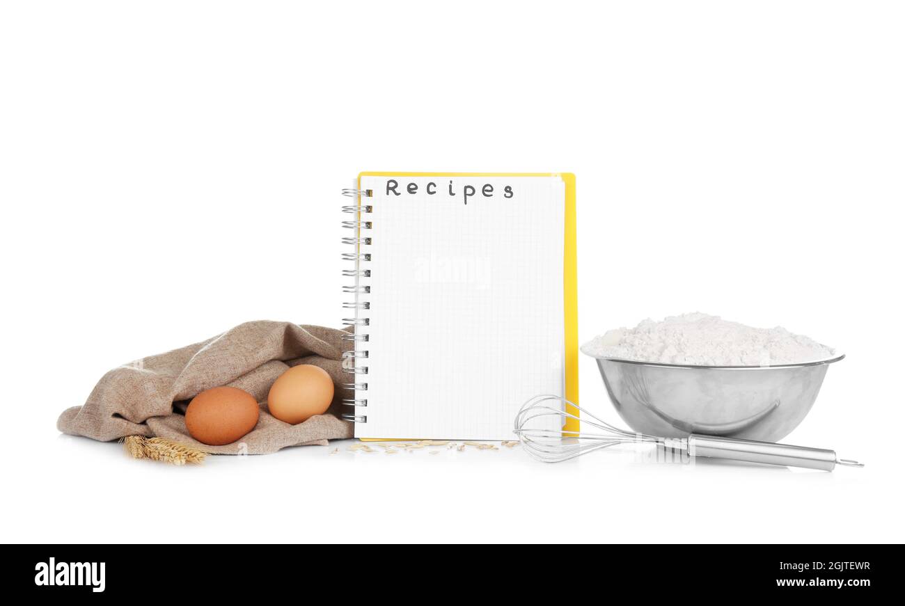 Open recipe book on white background Stock Photo - Alamy