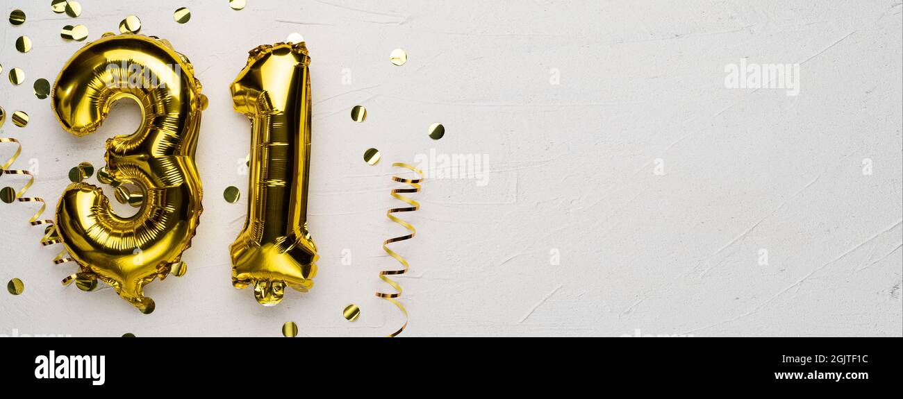 golden foil balloon number thirty-one. Birthday or anniversary card ...