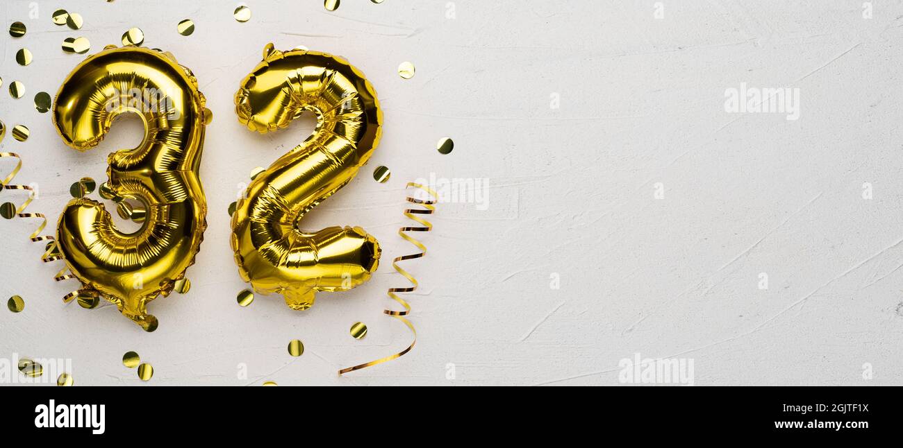 golden foil balloon number thirty two. Birthday or anniversary card ...