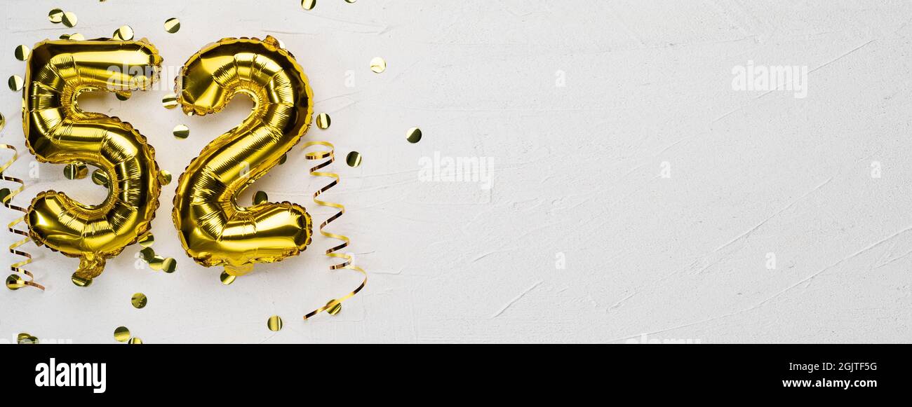 golden foil balloon number fifty two. Birthday or anniversary card with ...